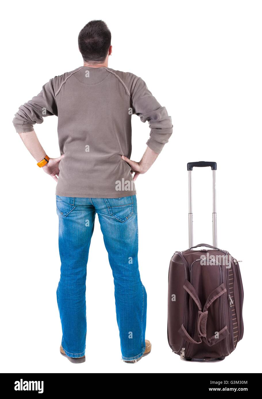 Back view of traveling man with suitcase looking up. Rear view people ...