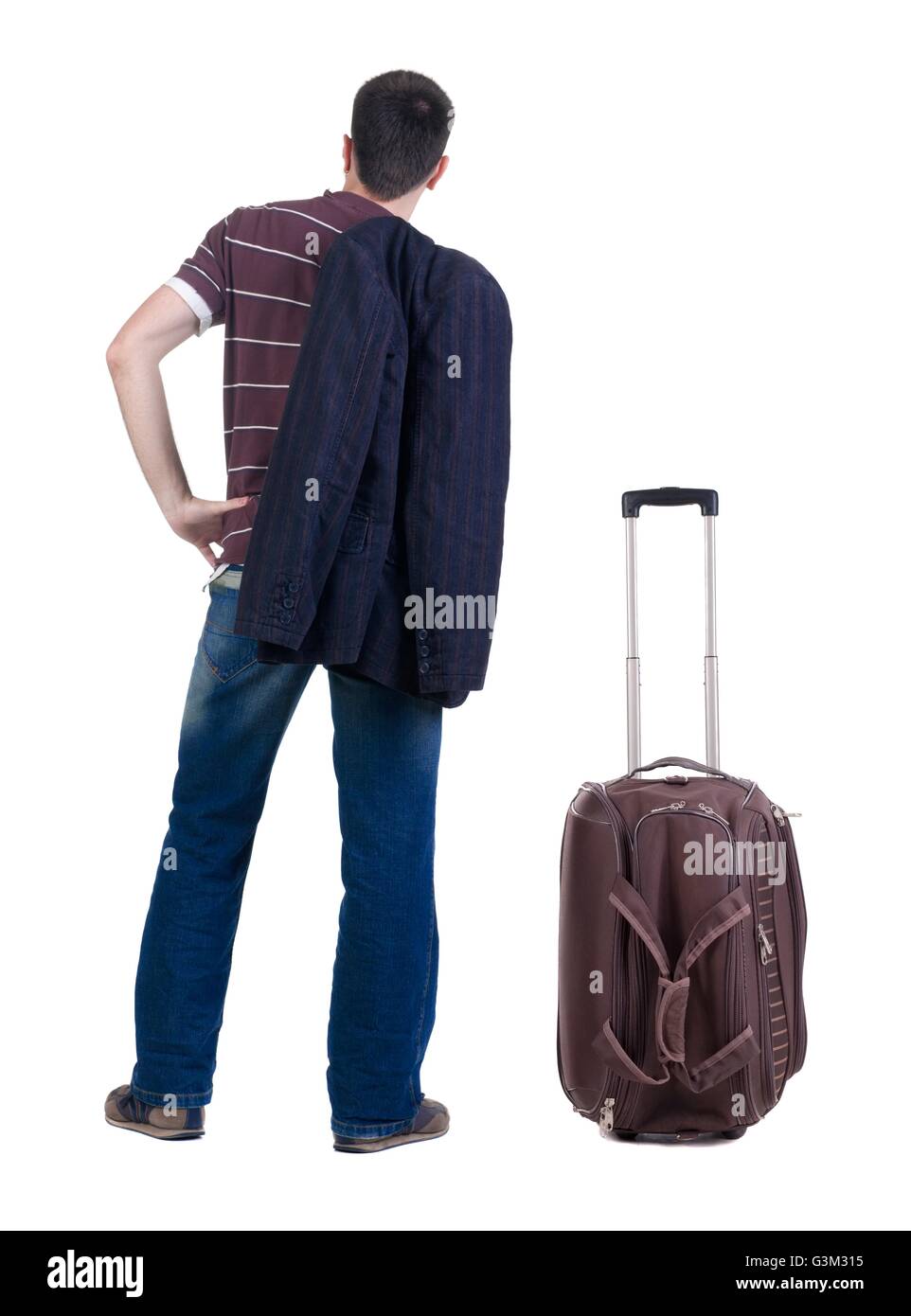 Back view of traveling busness man with suitcase looking up. Standing ...