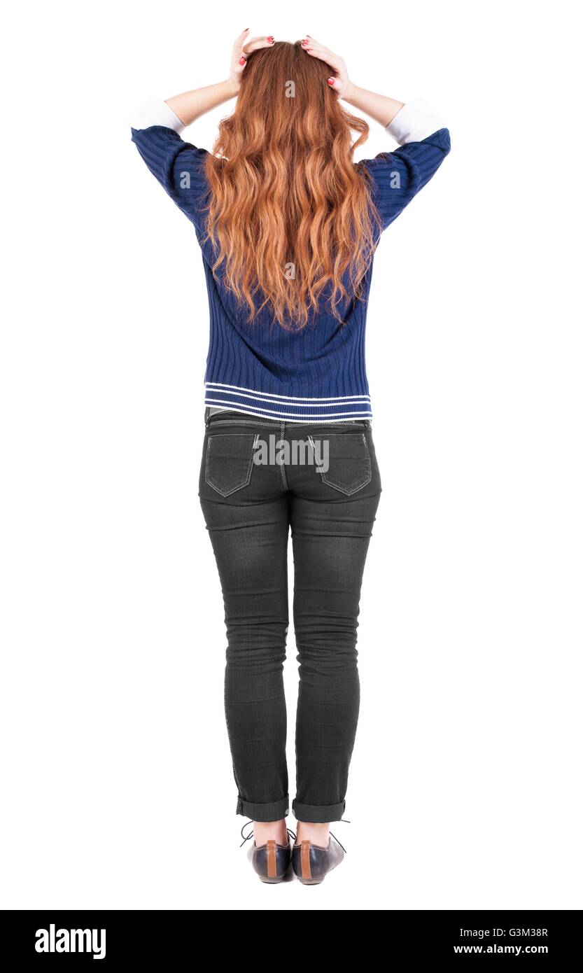 Back view of shocked woman . upset young redhead girl. Rear view people ...