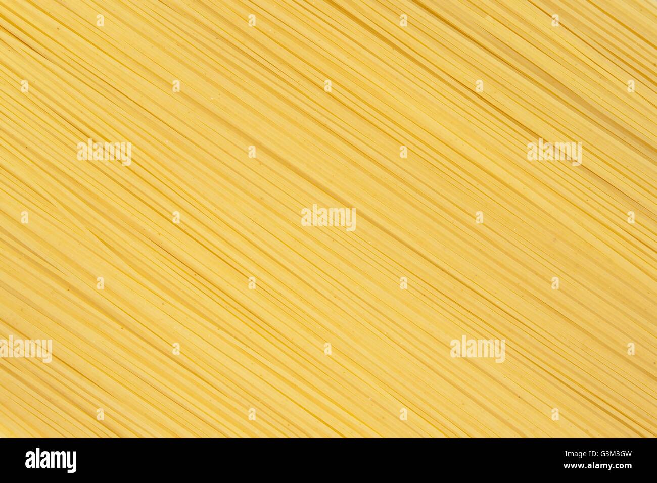 Raw italian spaghetti. Isolated over white background Stock Photo - Alamy