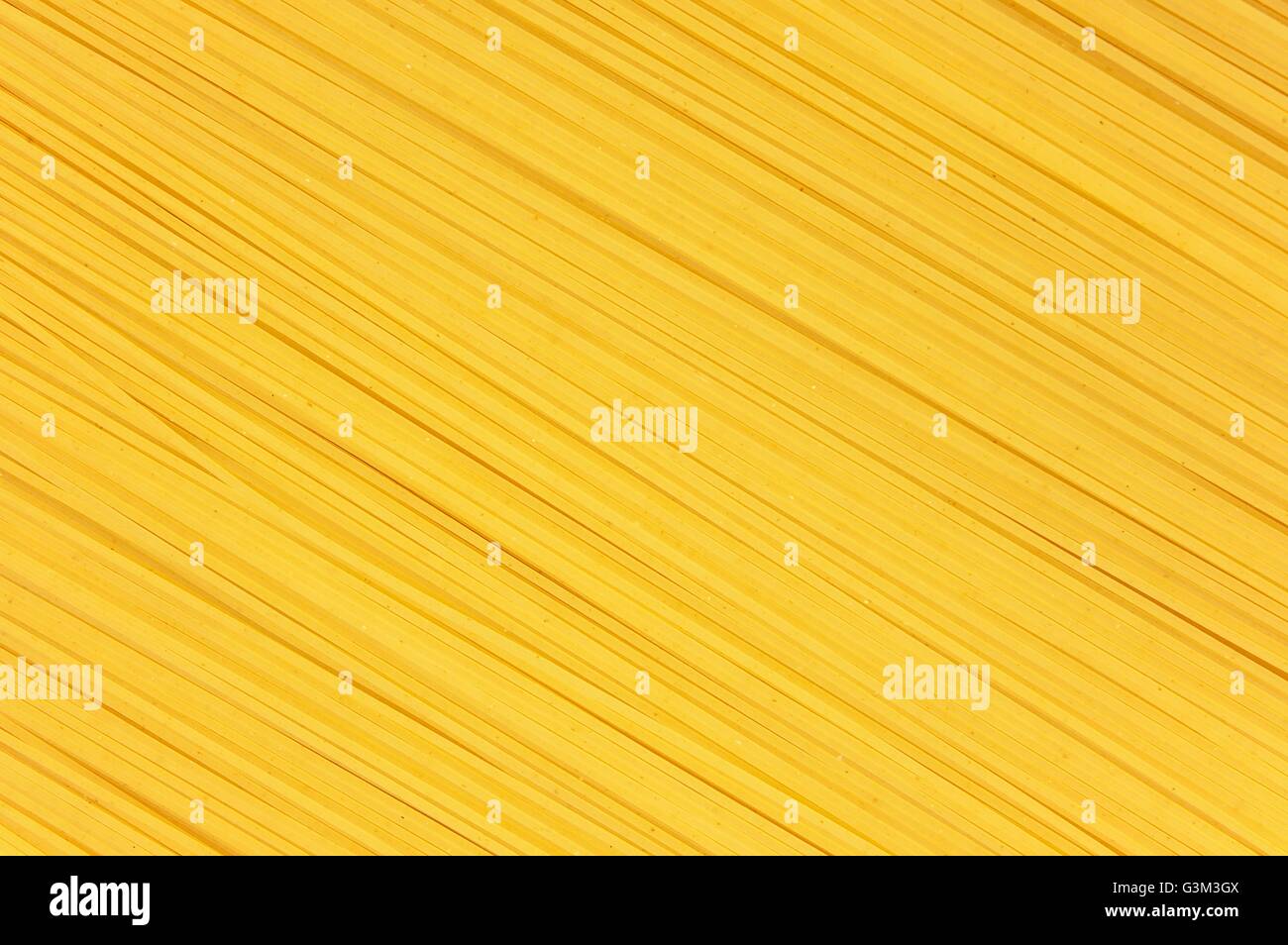 Raw italian spaghetti. Isolated over white background Stock Photo - Alamy