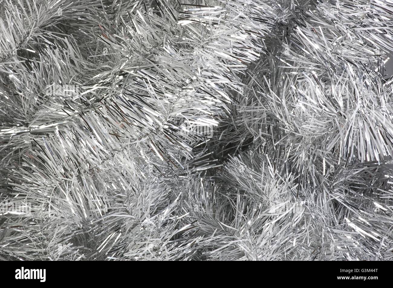 silver garland background close - up Stock Photo - Alamy