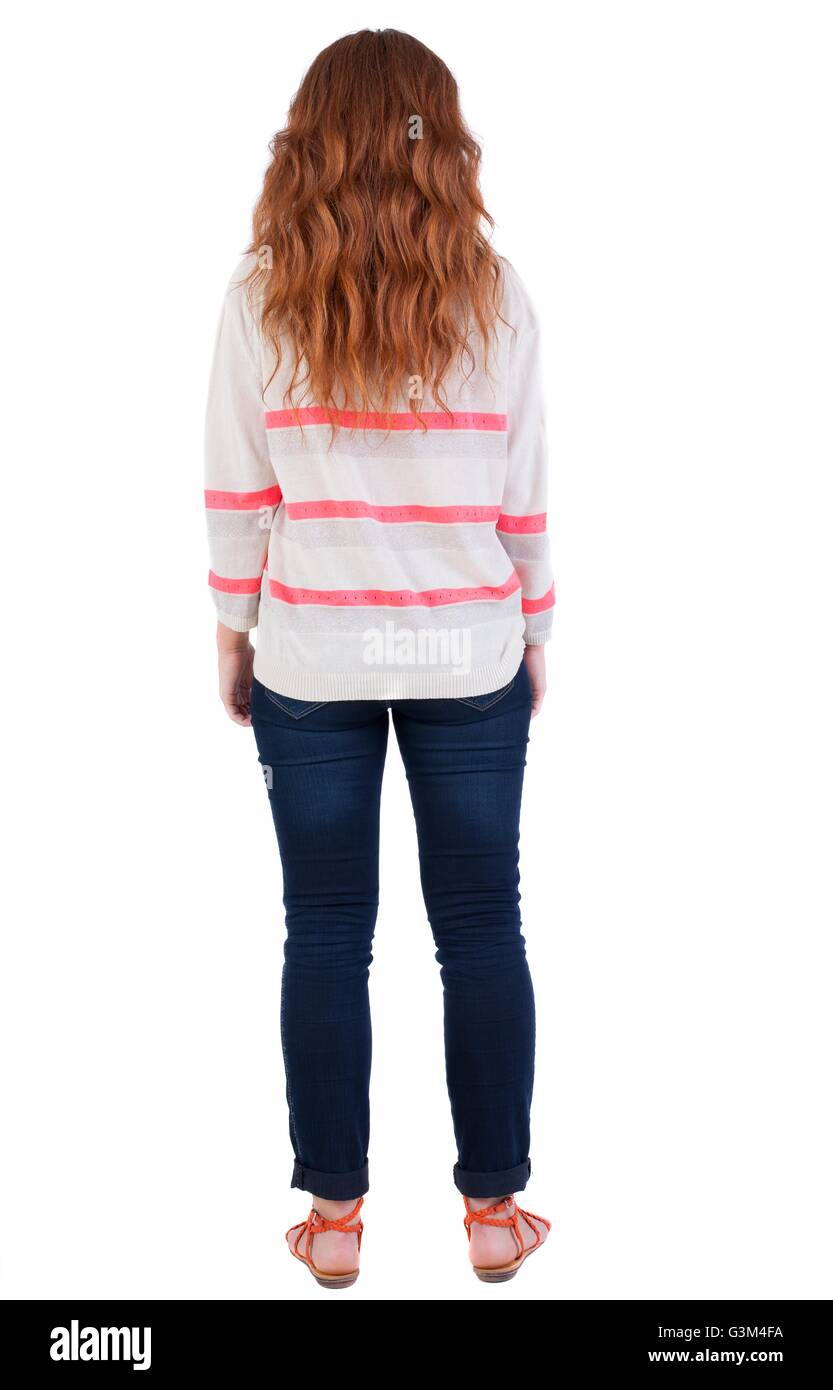 back view of standing young beautiful woman. girl watching. Rear view ...