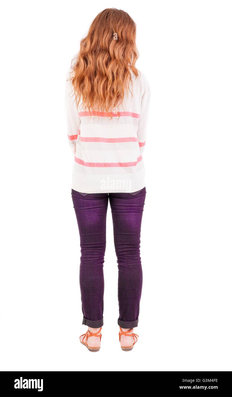 back view of standing young beautiful woman. girl watching. Rear view ...