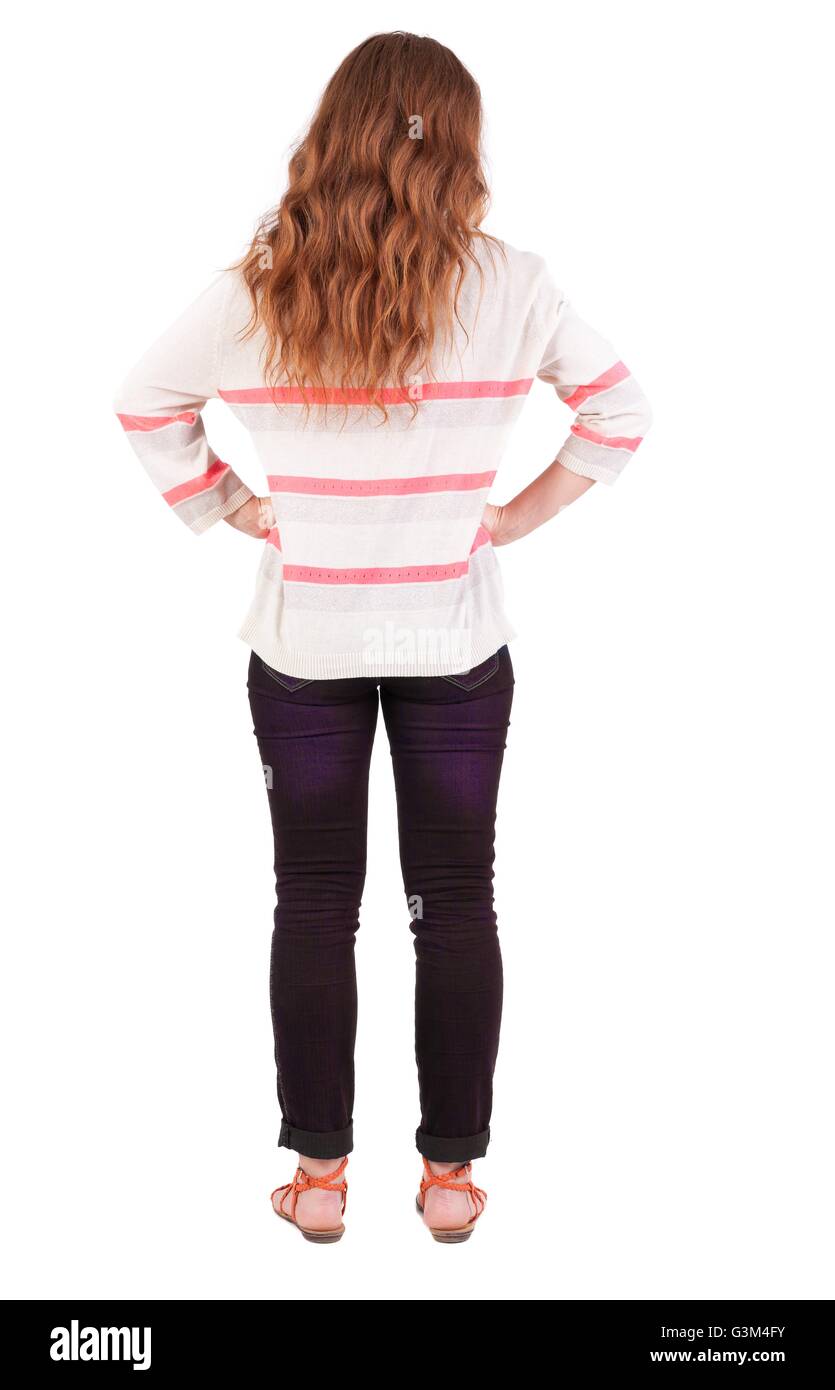 back view of standing young beautiful woman. girl watching. Rear view ...