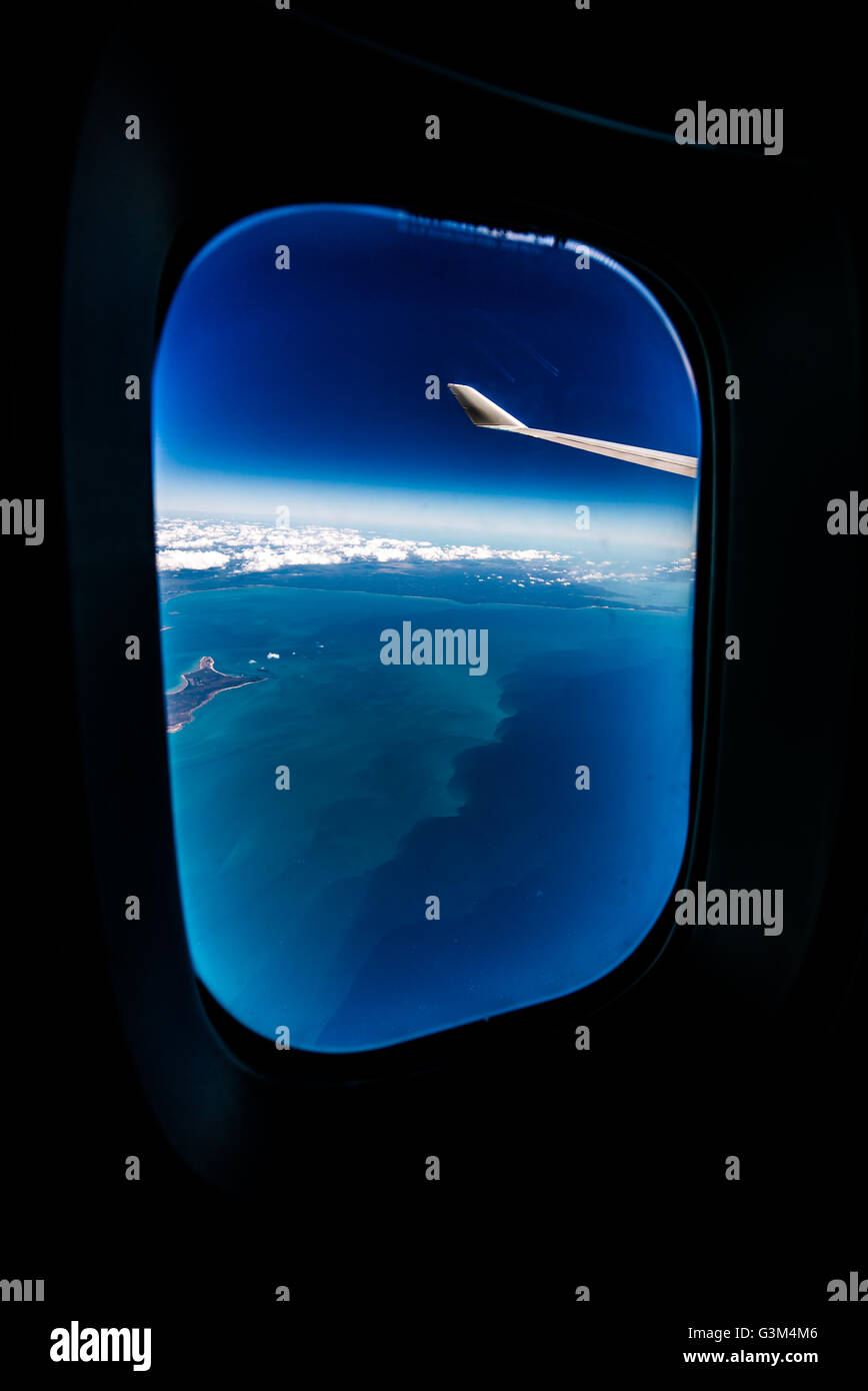 Airplane window lookout Stock Photo - Alamy