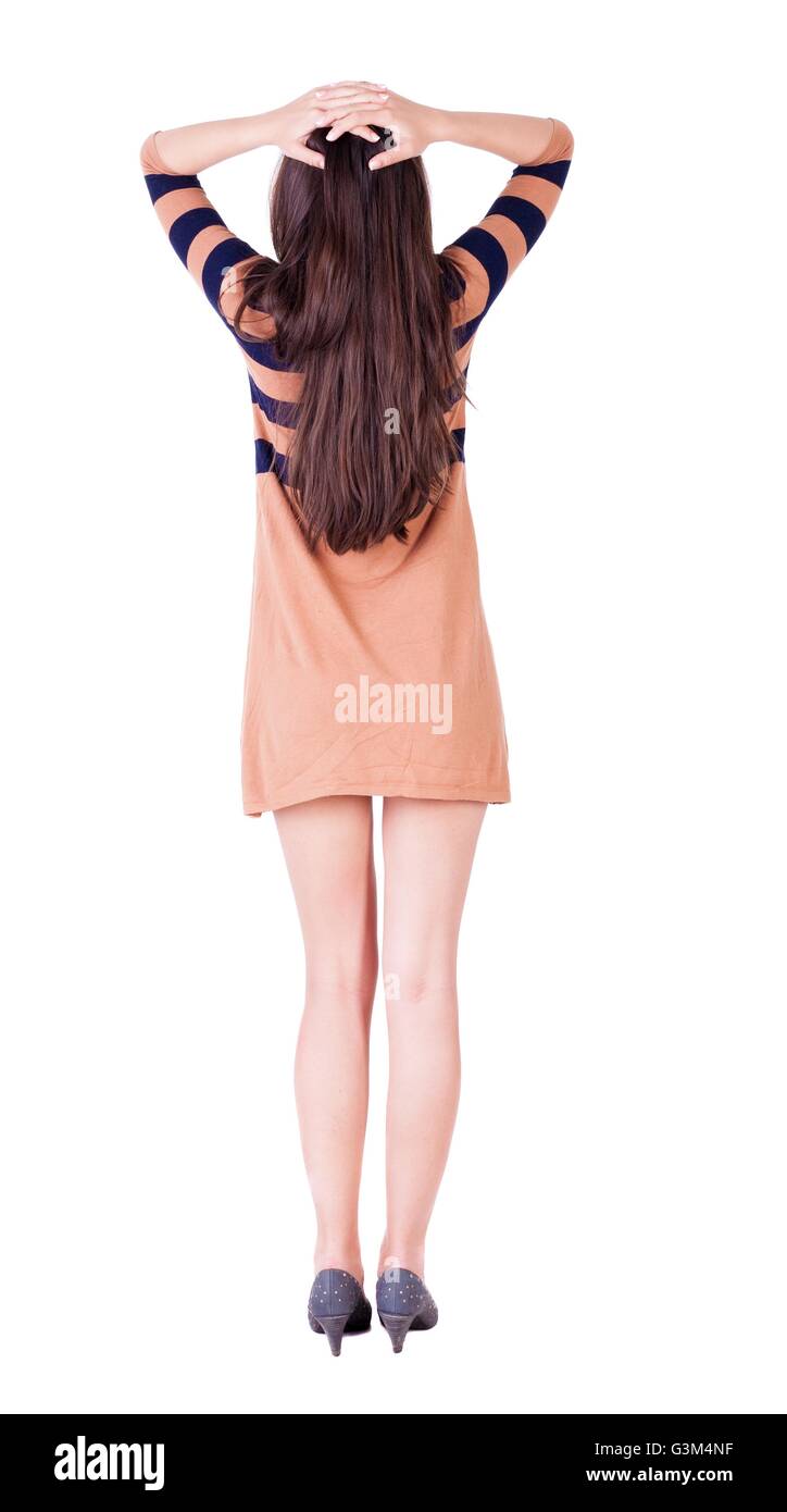 Back view of shocked brunette woman. backside view of person. Rear view ...