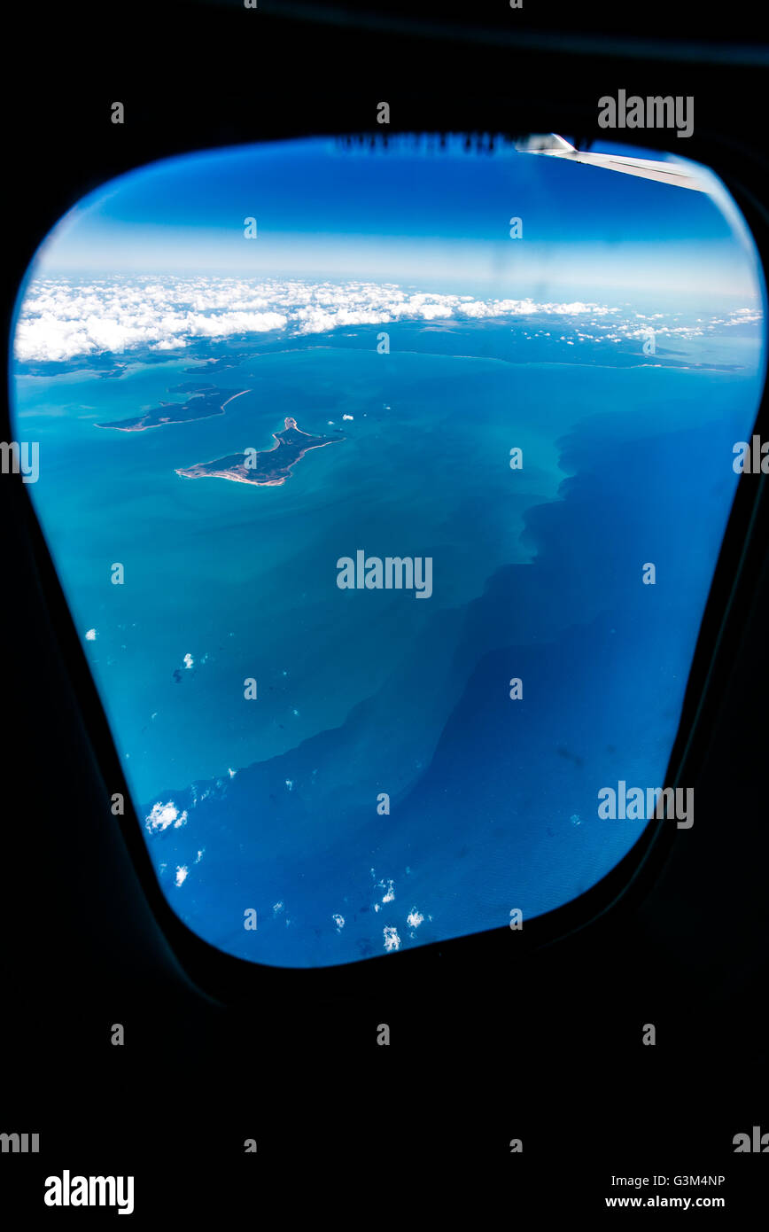 Airplane window lookout Stock Photo - Alamy