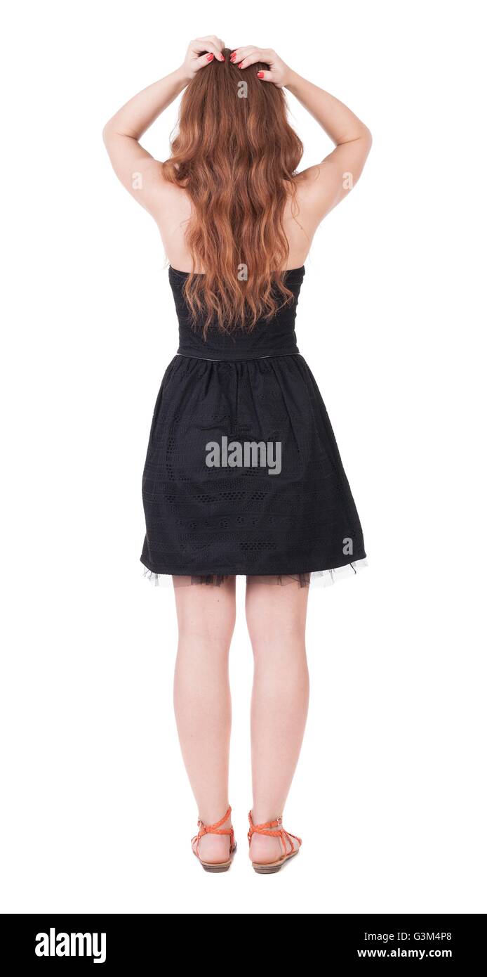 Back view of shocked redhead woman . upset young girl. Rear view people ...