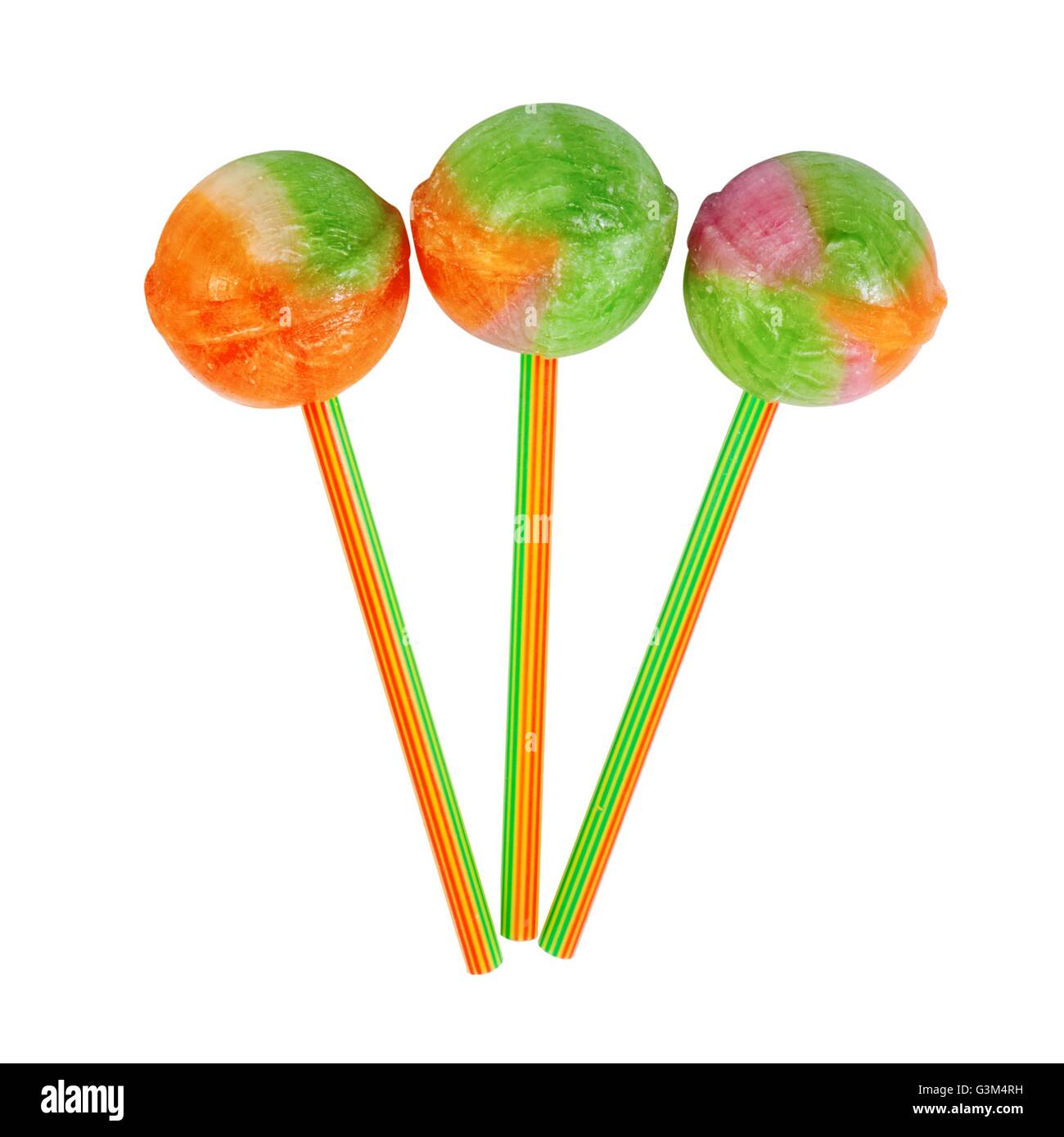 three multicolor lollipop candy isolated over white background Stock ...