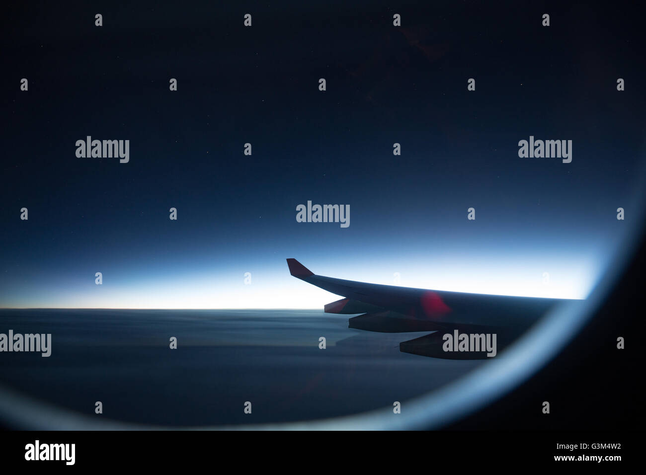 Airplane window lookout Stock Photo - Alamy