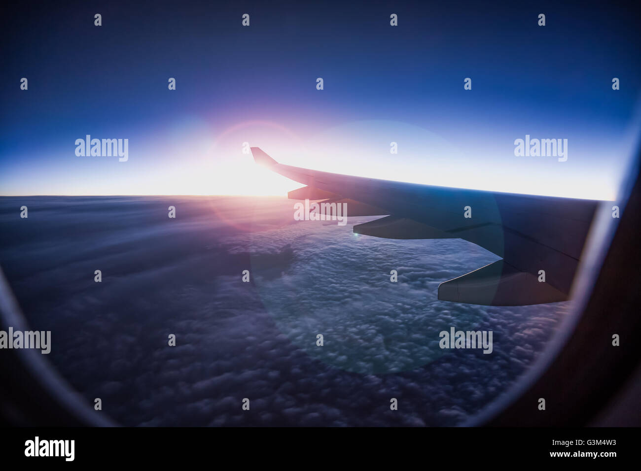 Airplane window lookout Stock Photo - Alamy