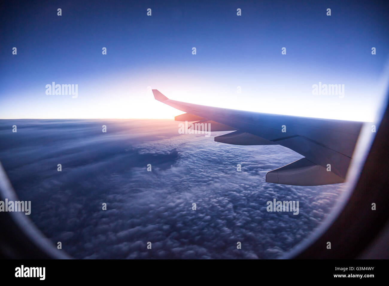 Airplane window lookout Stock Photo - Alamy