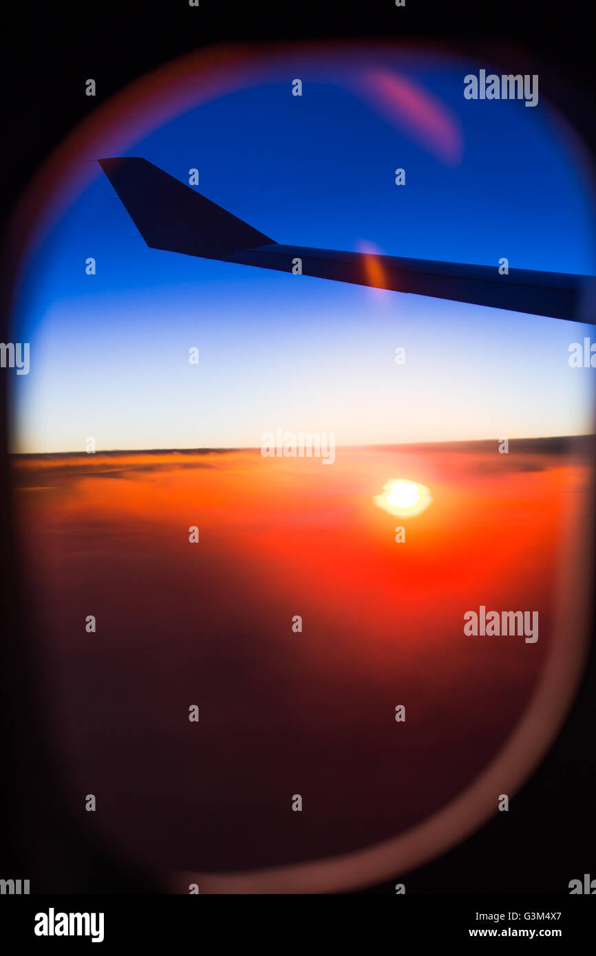 Airplane window lookout Stock Photo - Alamy