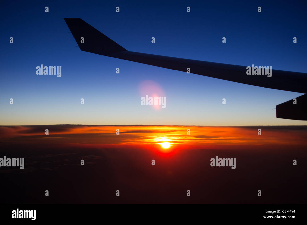 Airplane window lookout Stock Photo - Alamy