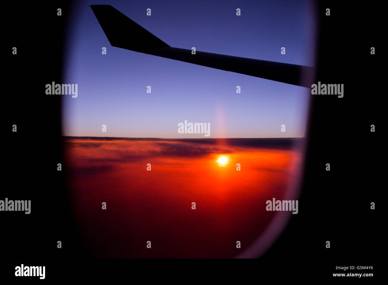Airplane window lookout Stock Photo - Alamy