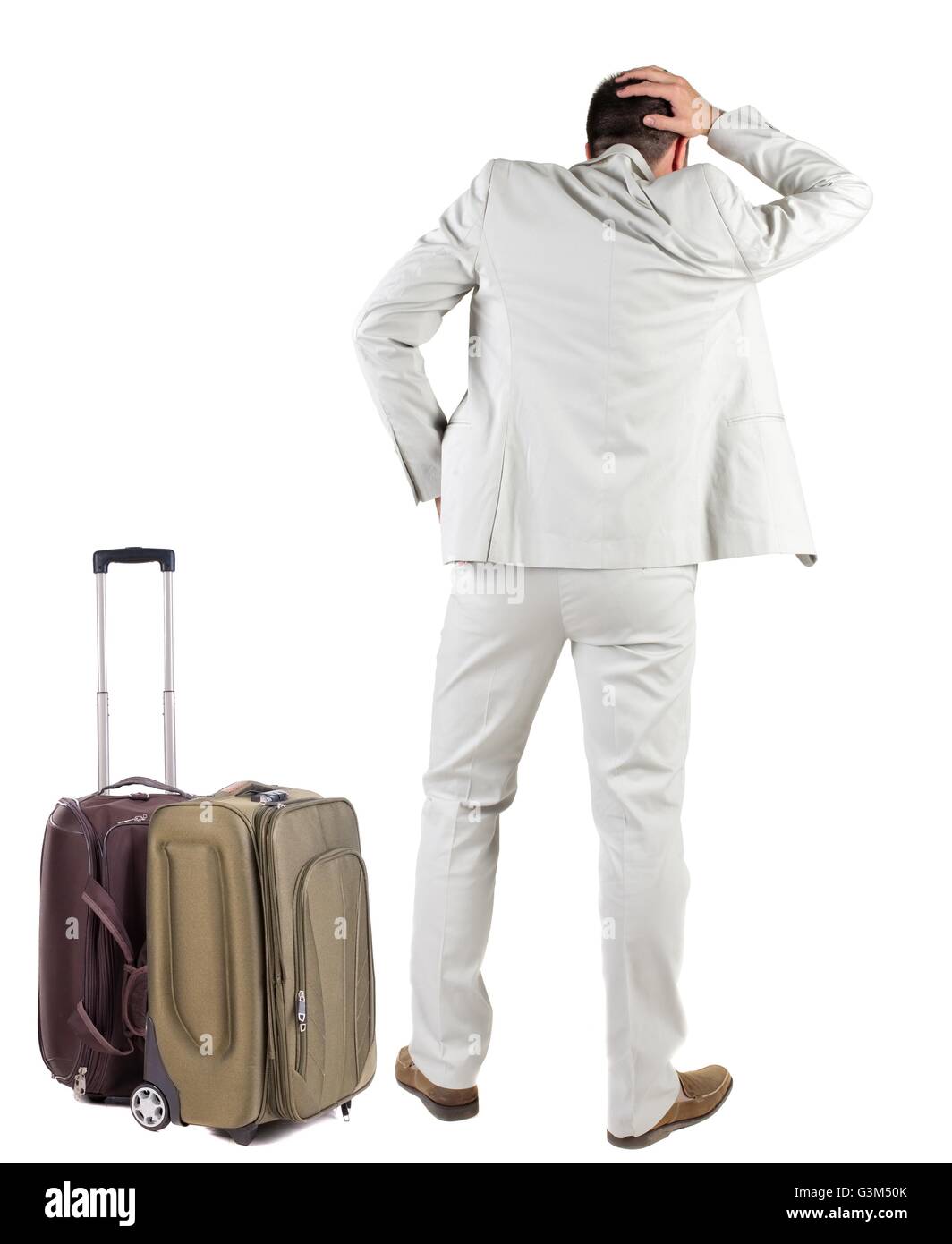 Back view of shocked business man with suitcase looking up. Rear view ...