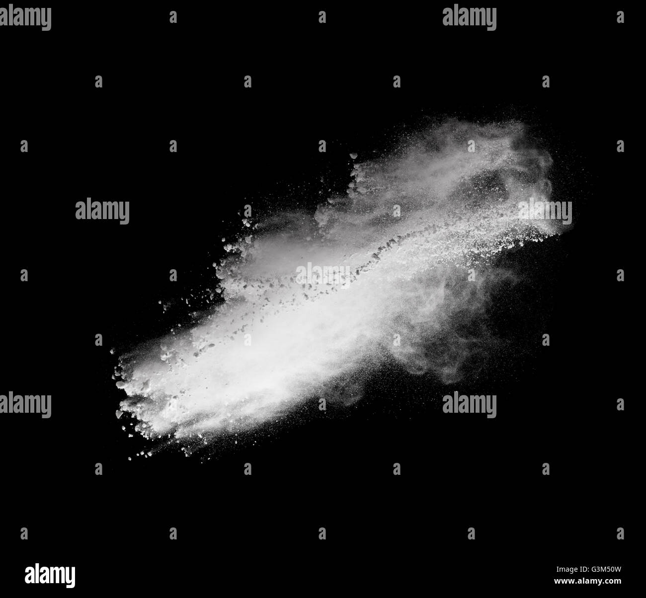 White powder explosion isolated on black background Stock Photo - Alamy