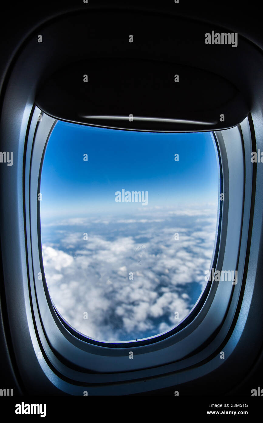 Airplane window lookout Stock Photo - Alamy