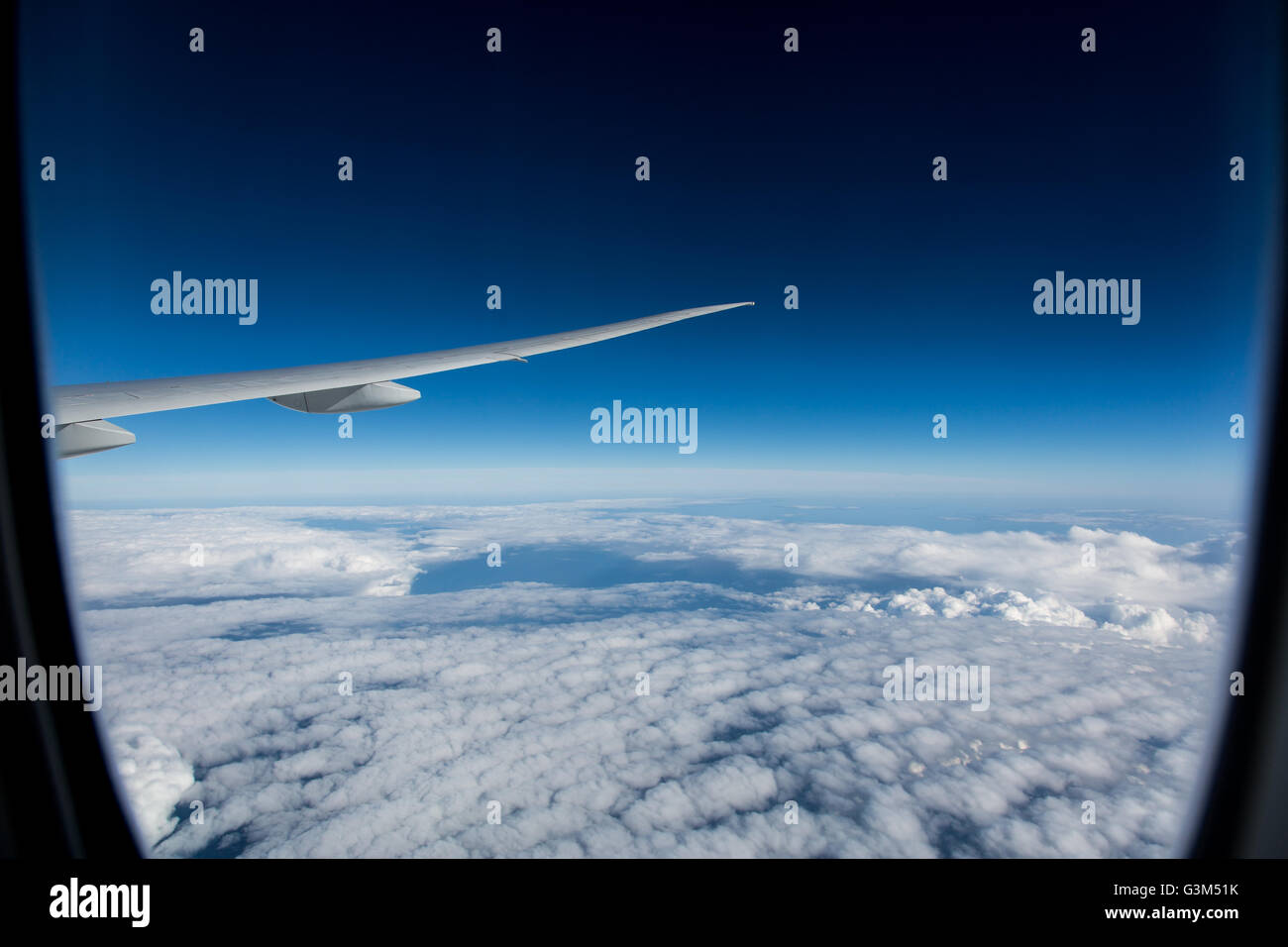 Airplane window lookout Stock Photo - Alamy
