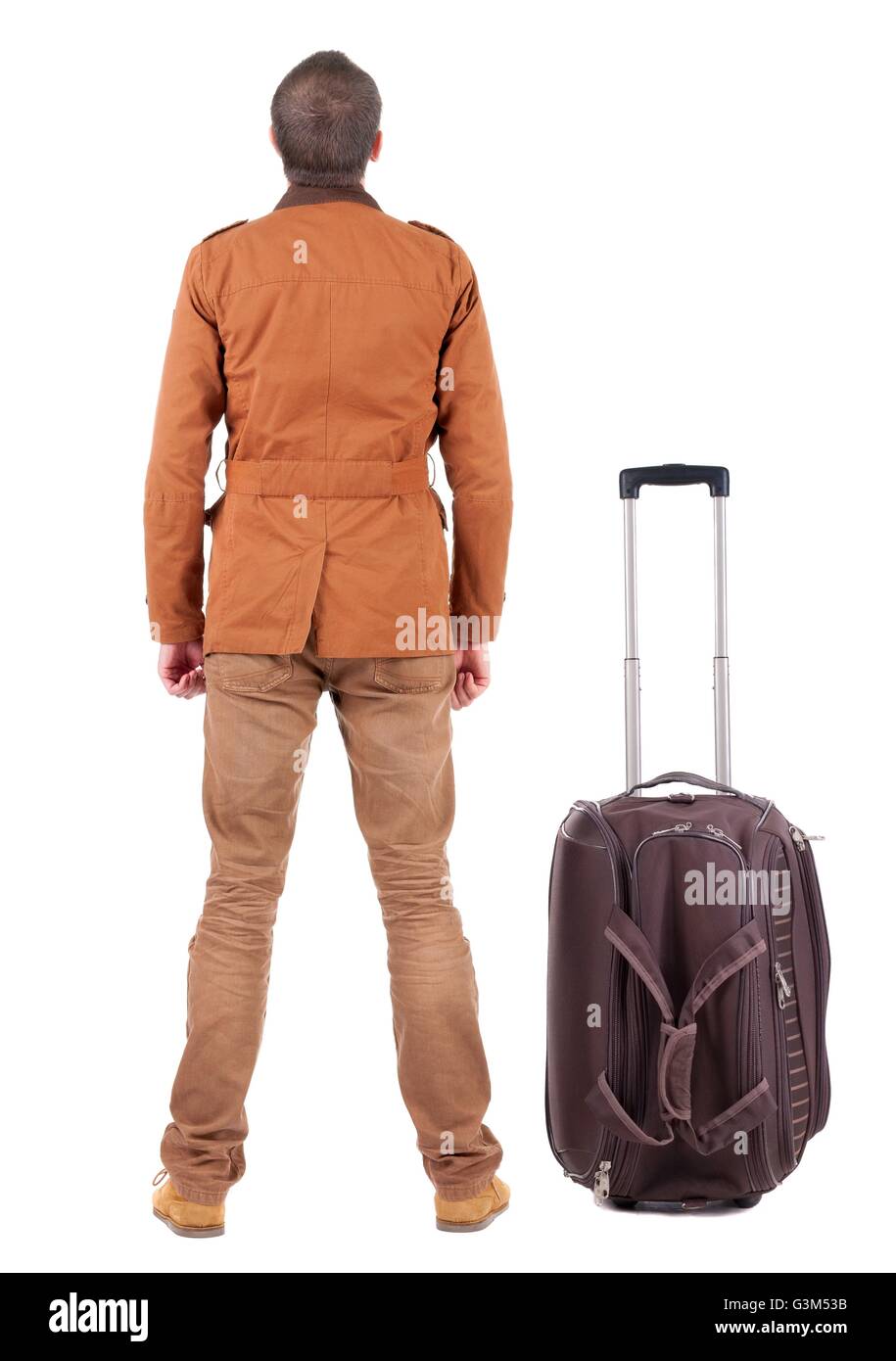 Back view of traveling busness man with suitcase looking up. Standing ...