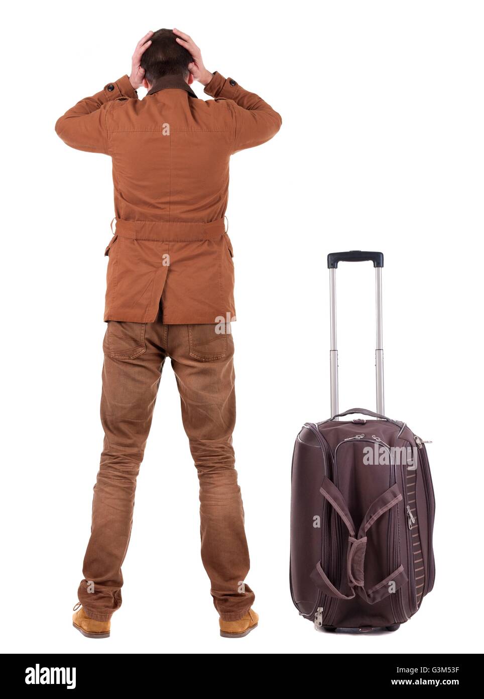 Back view of shocked business man with suitcase looking up. Rear view ...