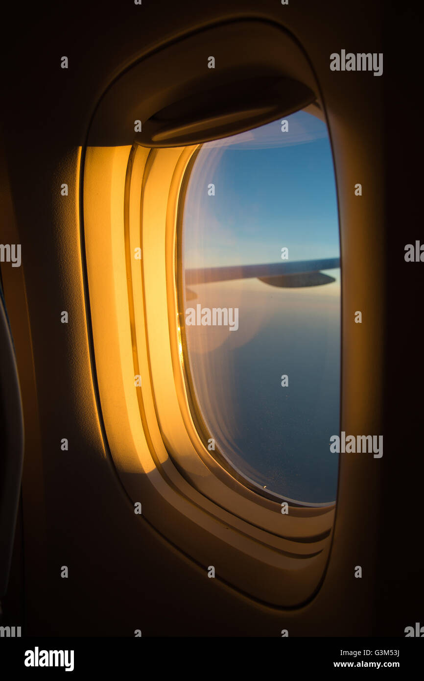 Airplane window lookout Stock Photo - Alamy