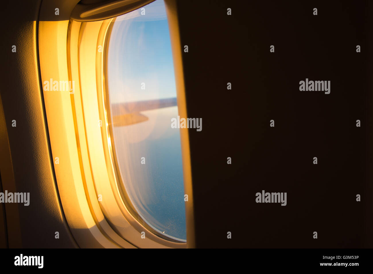 Airplane window lookout Stock Photo - Alamy