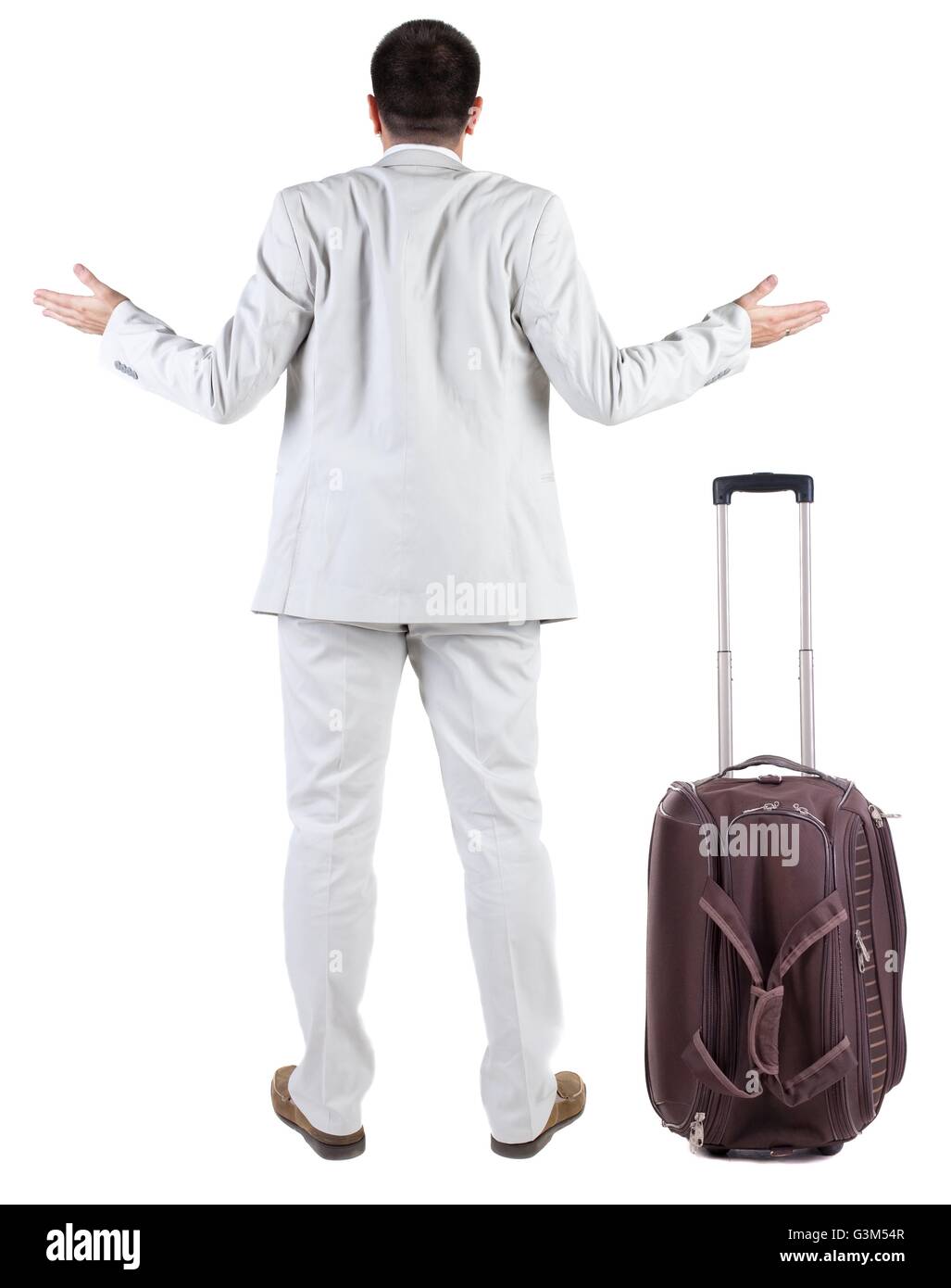 Back view of shocked business man with suitcase looking up. Rear view ...