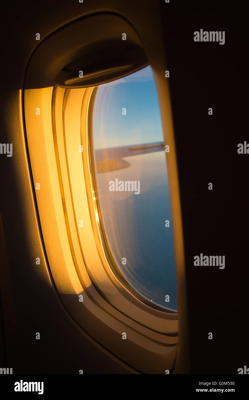 Airplane window lookout Stock Photo - Alamy