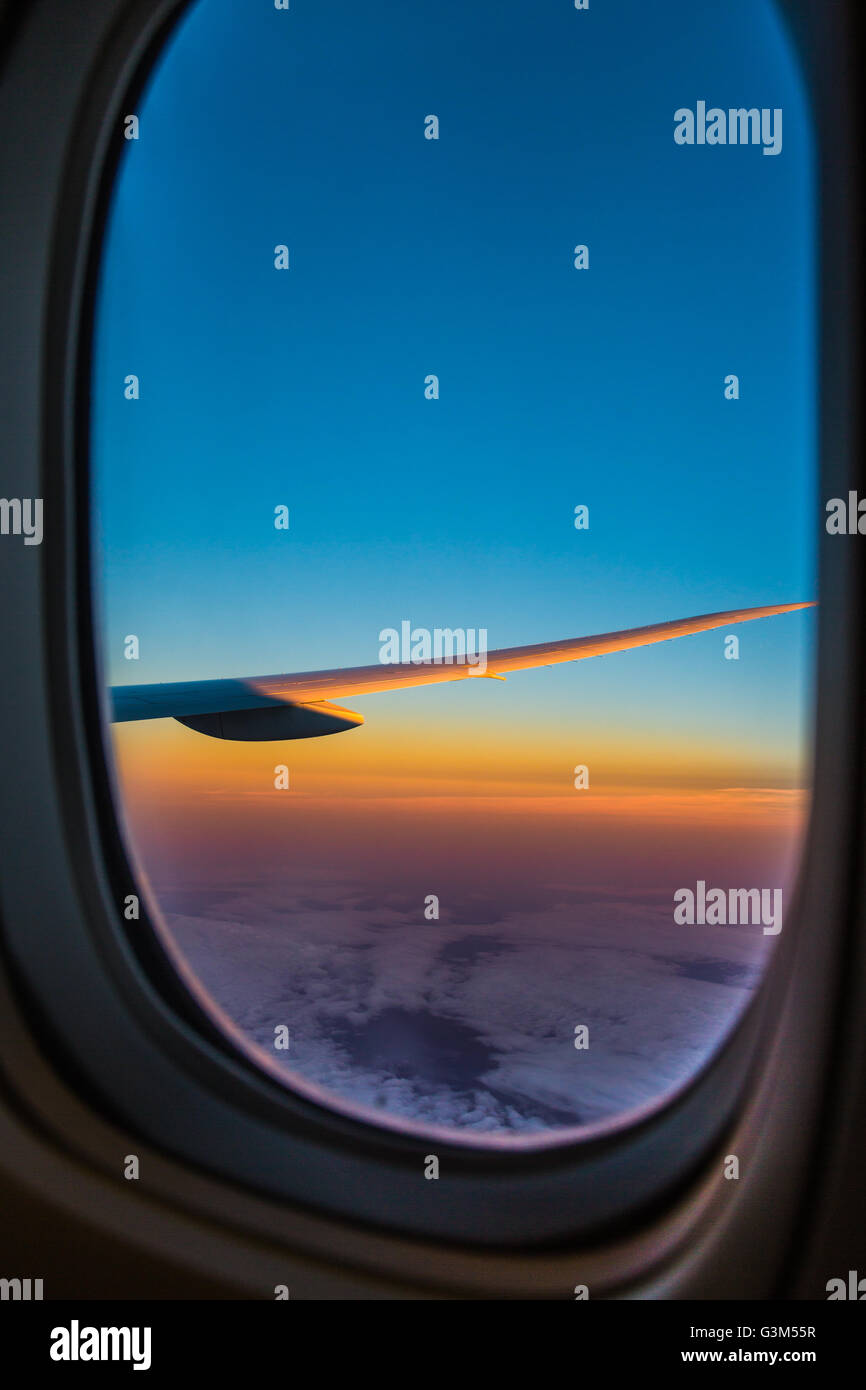 Airplane window lookout Stock Photo - Alamy
