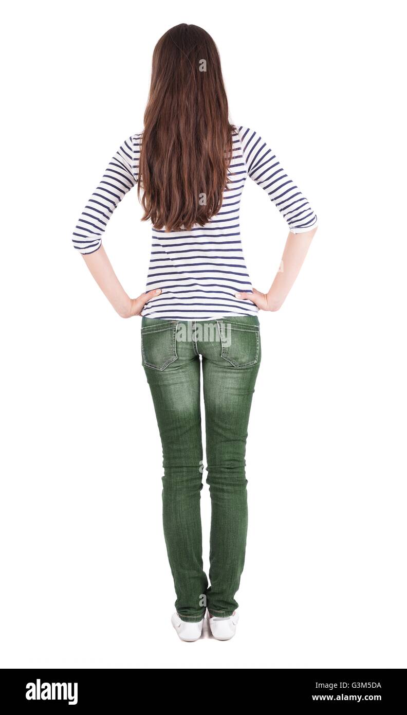 back view of standing young beautiful brunette woman. girl watching ...
