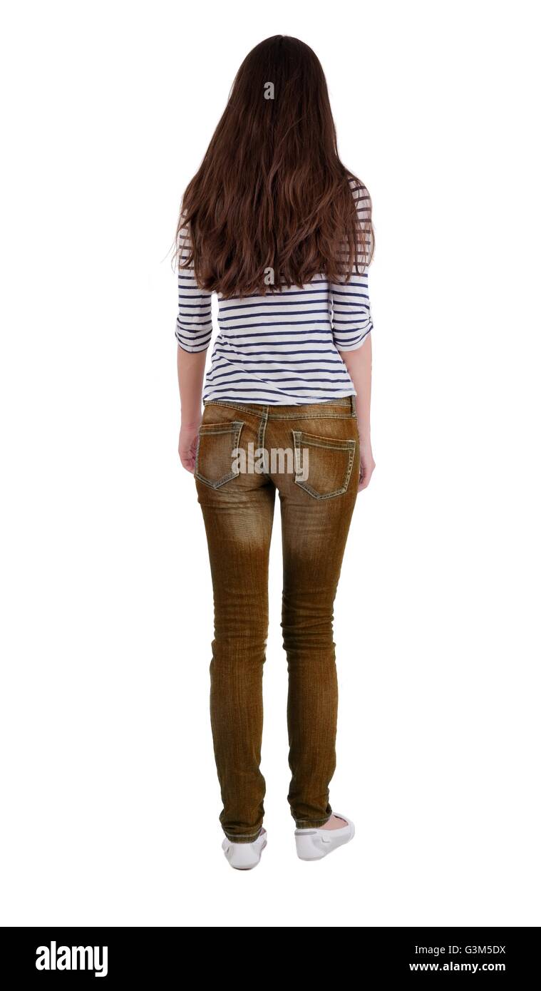 back view of standing young beautiful brunette woman. girl watching ...