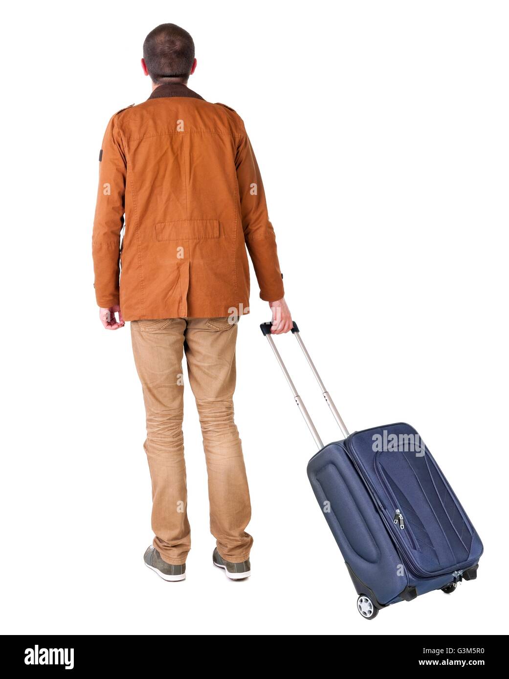 Back view of stylishly dressed man in a brown jackett with green ...