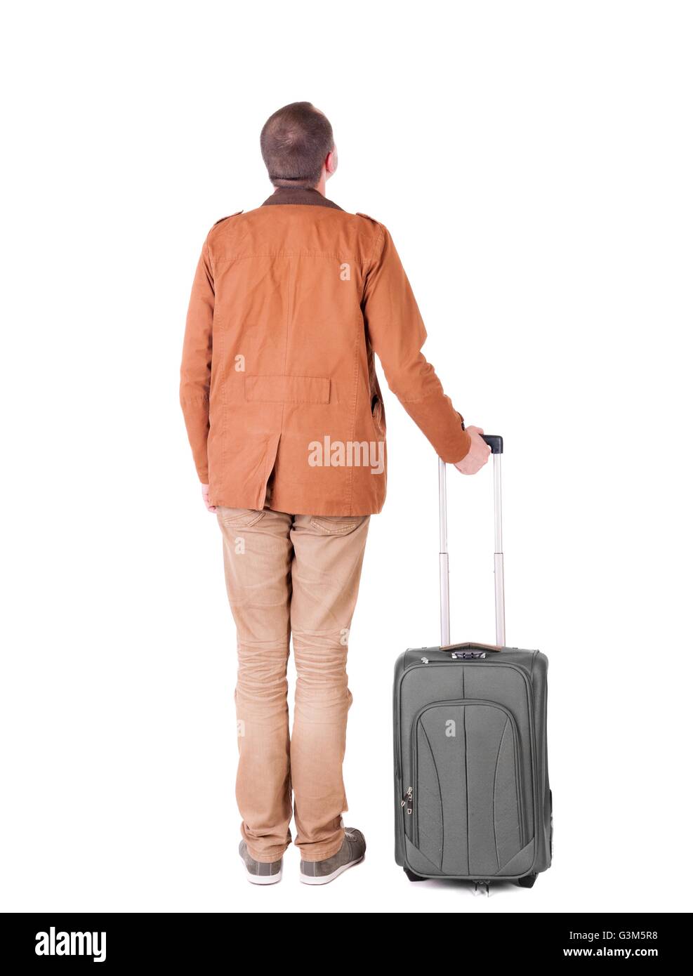 Back view of stylishly dressed man in a brown jackett with green ...