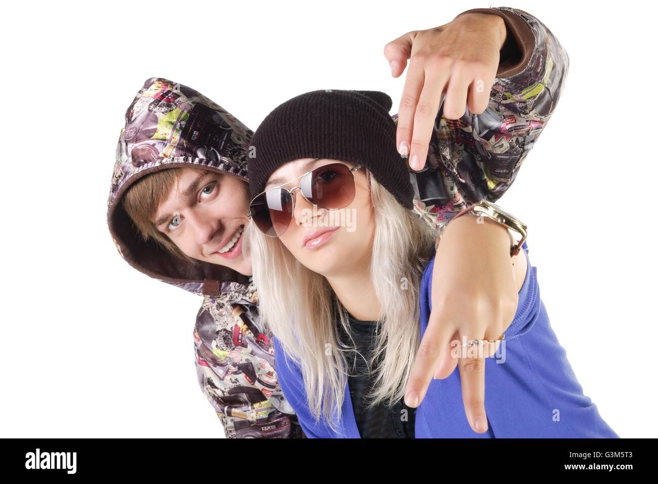 Teenage smiling rap couple. Isolated over white Stock Photo - Alamy