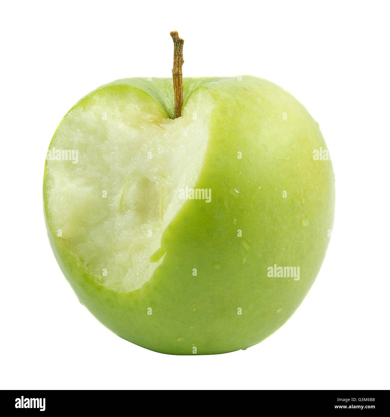 Green apple bit. Isolated over white Stock Photo - Alamy