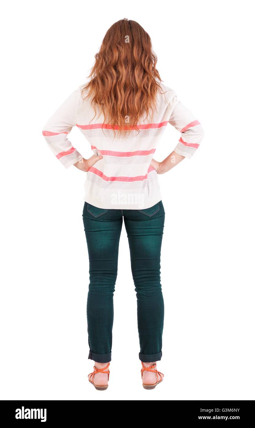 back view of standing young beautiful woman. girl watching. Rear view ...
