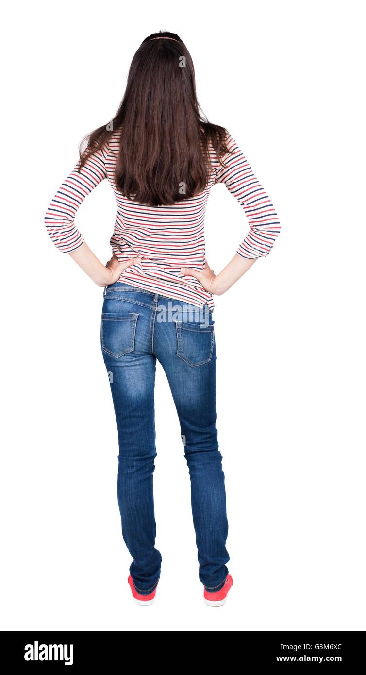 back view of standing young beautiful brunette woman. girl watching ...