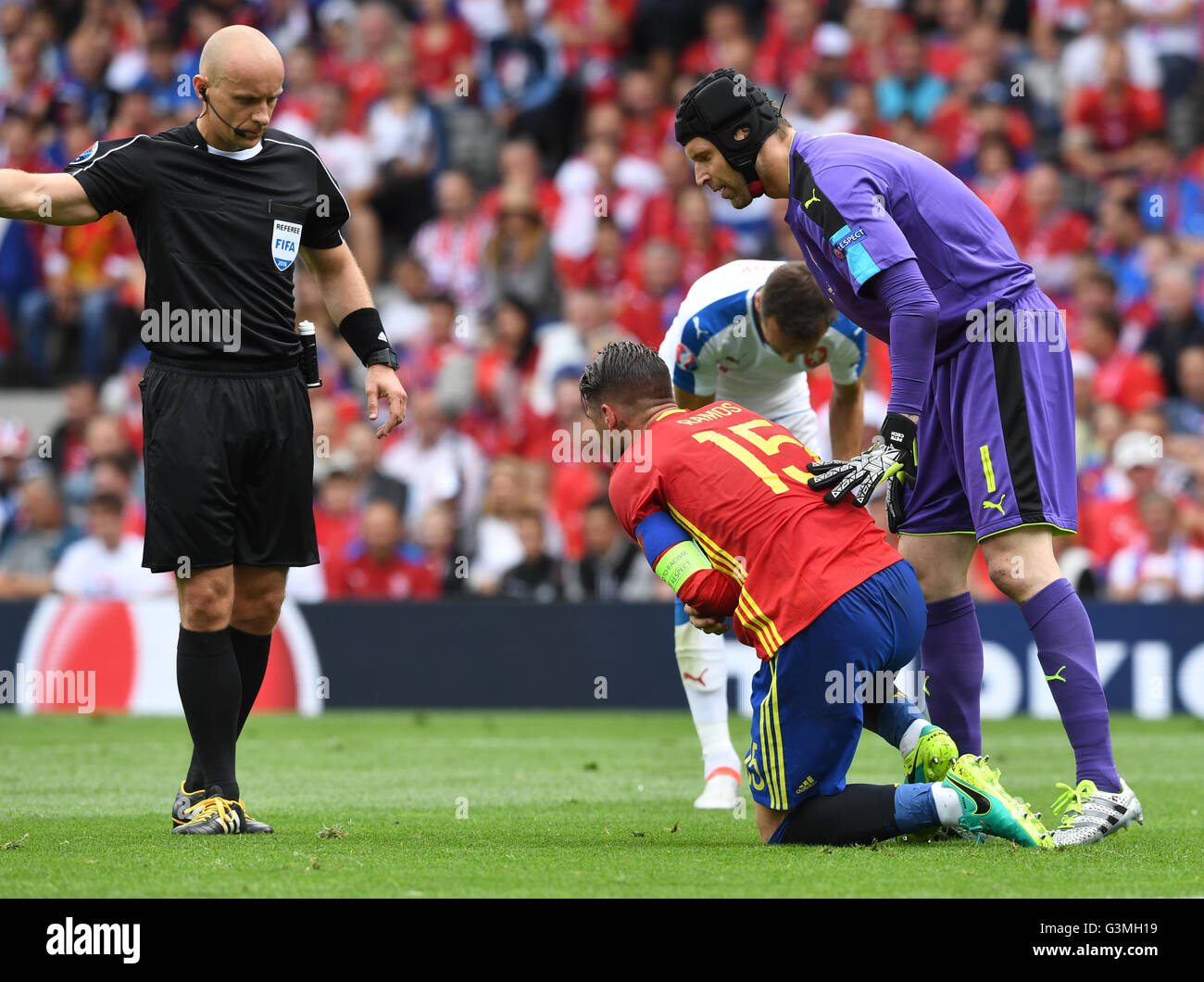 Sergio Ramos (15) of Spain is comforted by goalkeeper Petr Cech of ...