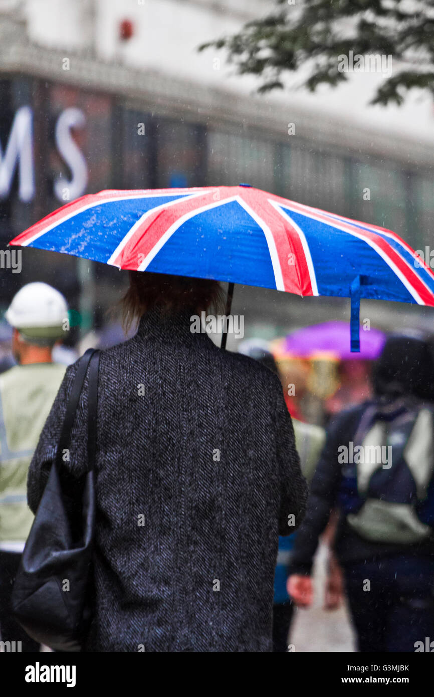UK Weather: Heavy rain in Manchester 13 June 2016. Scattered heavy ...