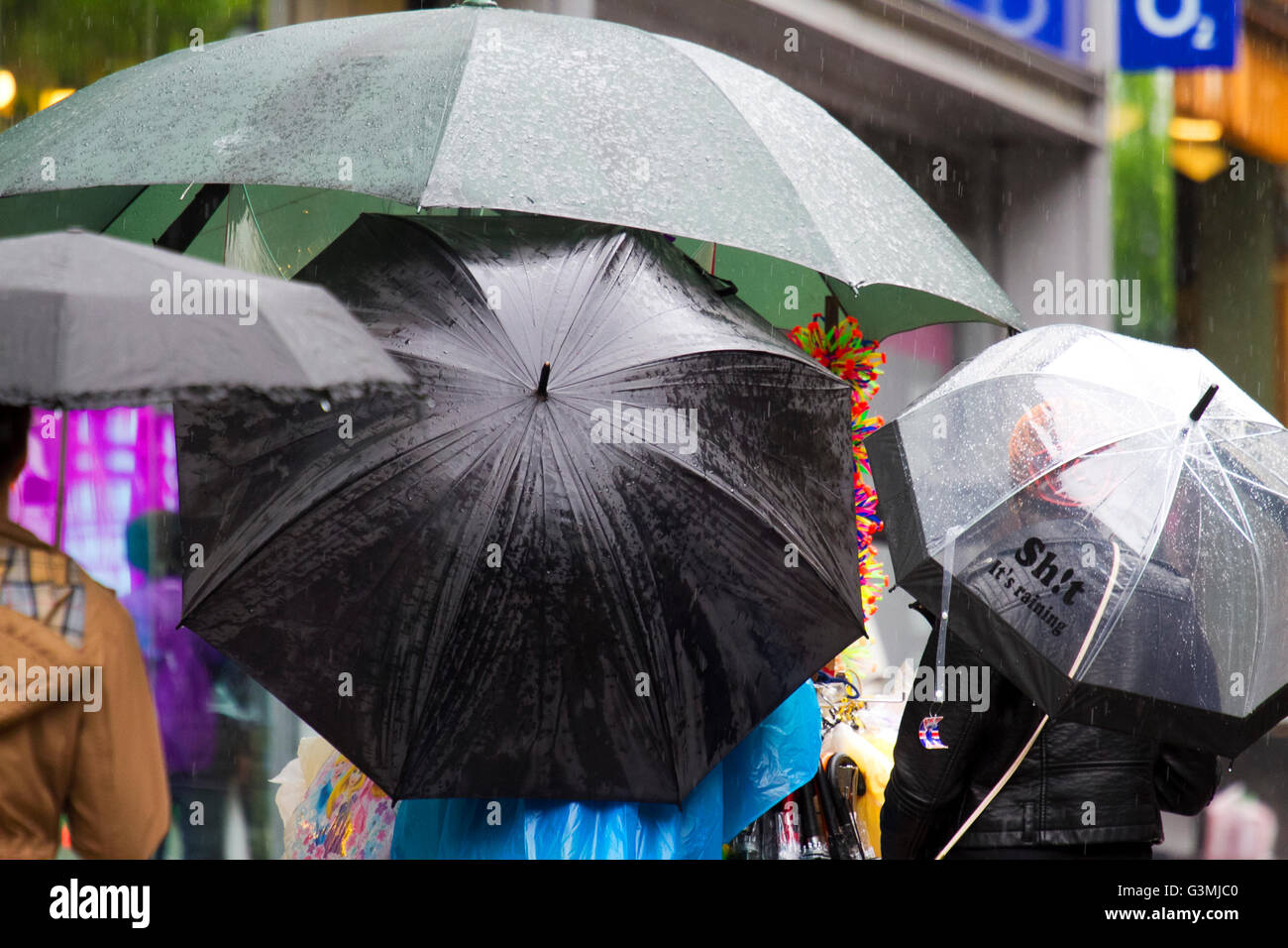 Heavy Rain Umbrella City Stock Photos & Heavy Rain Umbrella City Stock ...