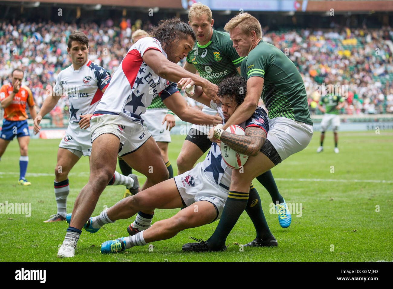 Thretton Palamo (front L-R) and Folau Niua of the USA in action against ...