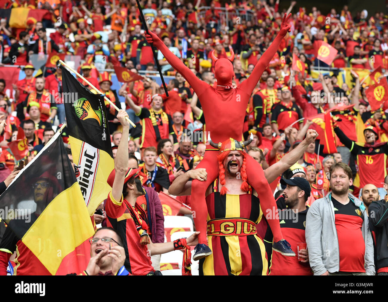 Lyon, France. 13th June, 2016. Belgian supporters cheer before the ...