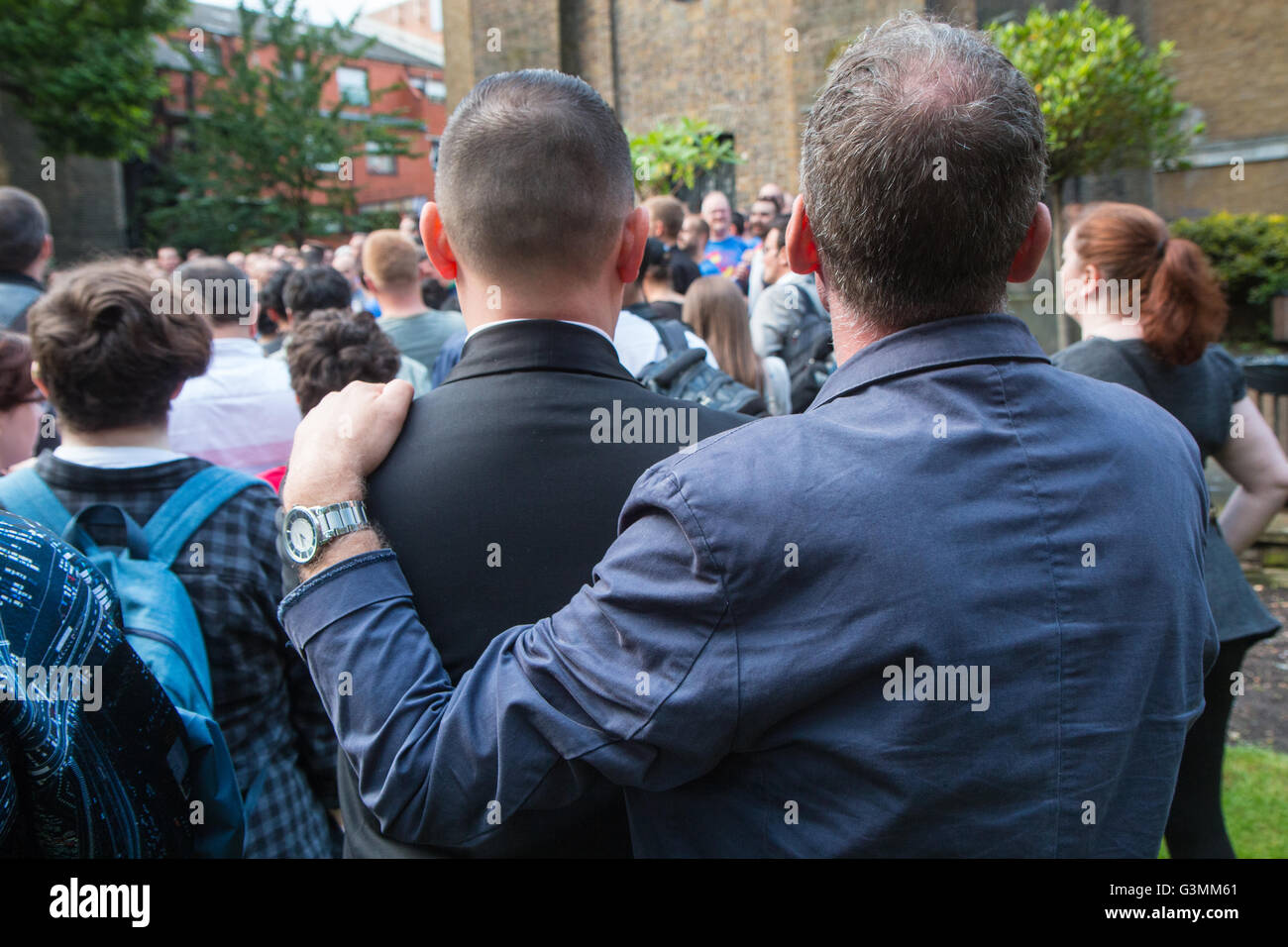 two men holding each other Stock Photo - Alamy