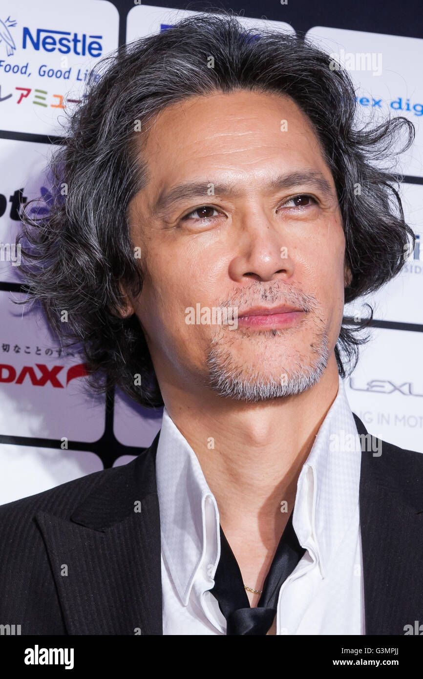 Actor Masaya Kato poses for the cameras on the red carpet during the ...