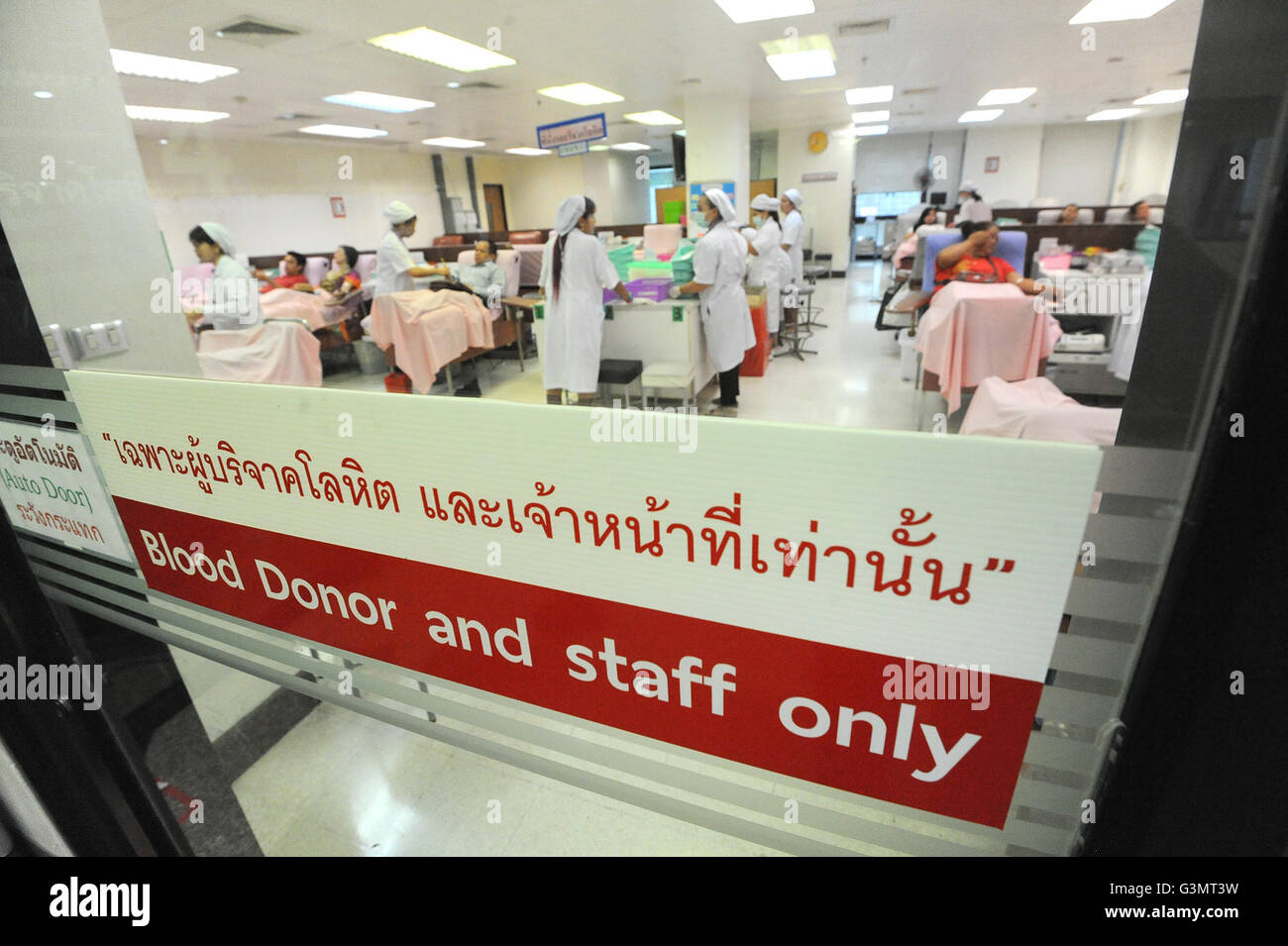 Bangkok, Thailand. 14th June, 2016. Thai volunteers donate blood at ...