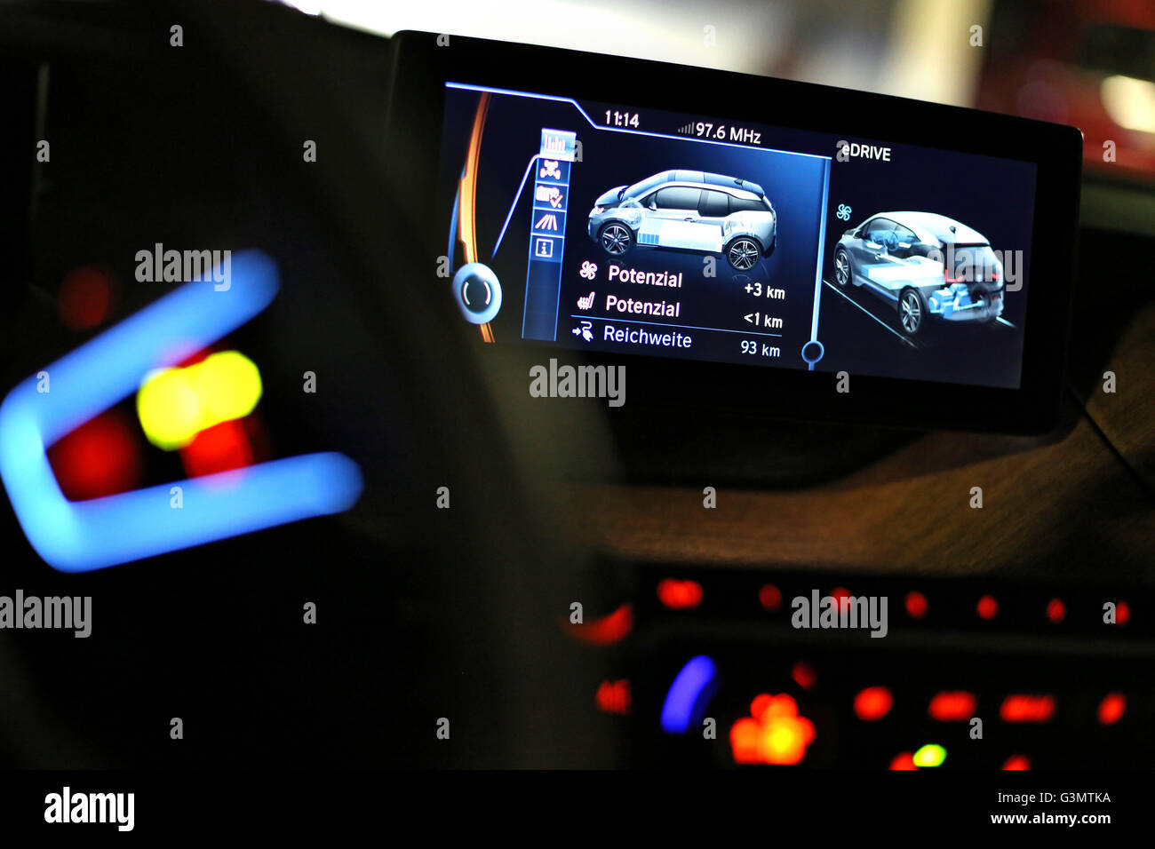 The display of an electrical powered BMW i3 informs about power saving ...