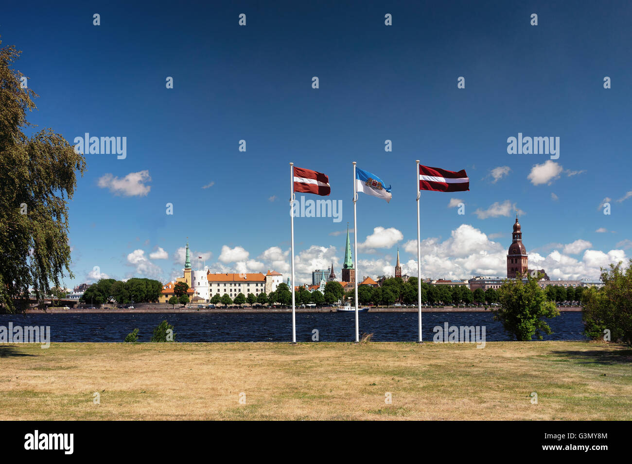 Panorama of Riga against the blue sky with clouds and the national ...