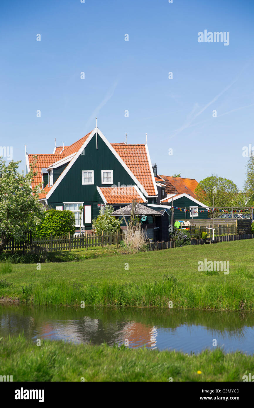 Old fishing green cottages on the island of Marken Netherlands Stock ...